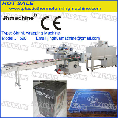 China Note book Auotmatic shrink wrapping /flow Pack Machine With Strink Tunnel CE Standard supplier